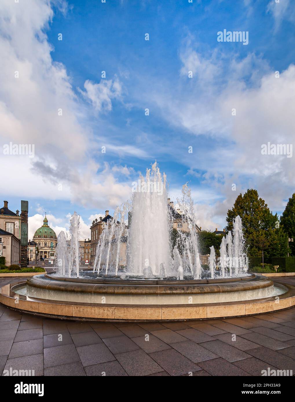 Copenhagen, Denmark - September 13, 2010: Central fountain spouting ...