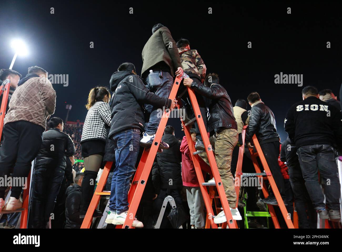 QIANDONGNAN, CHINA - MARCH 25, 2023 - Photographers take photos of the ...