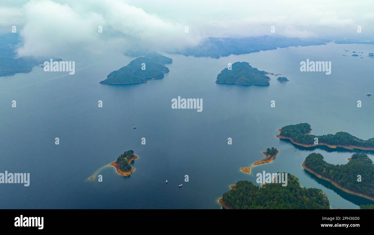 HANGZHOU, CHINA - MARCH 25, 2023 - Aerial photo shows clouds shrouding ...