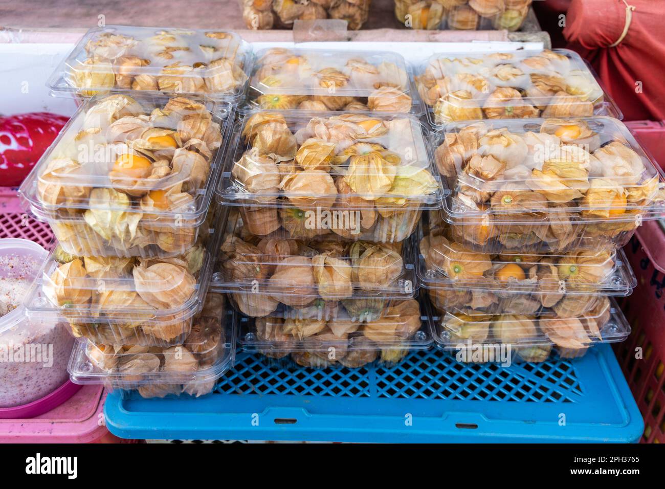 Boxes of goose berries with skin intact for sale at market stall Stock ...