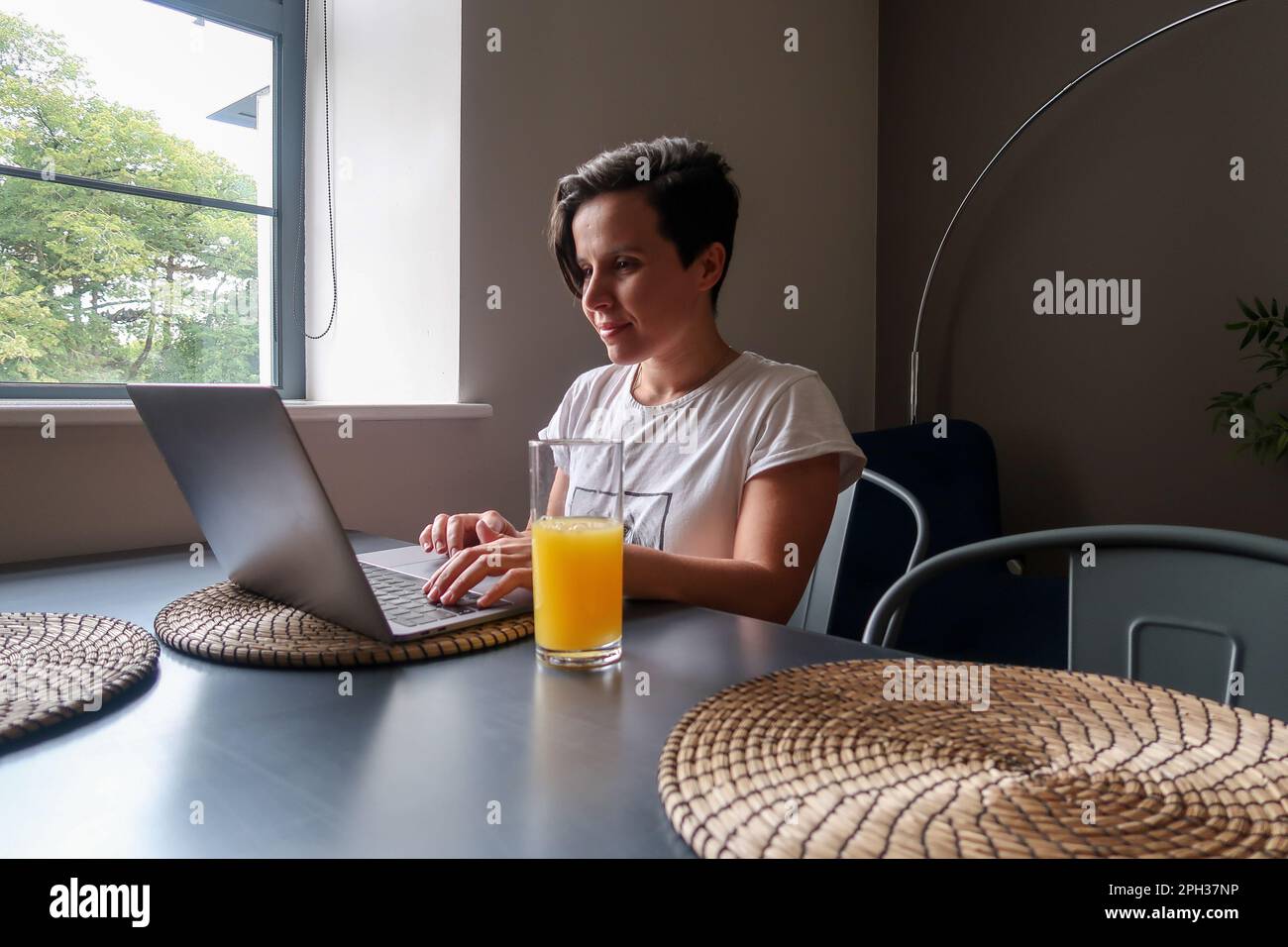 Woman working remotely on hi-res stock photography and images - Alamy