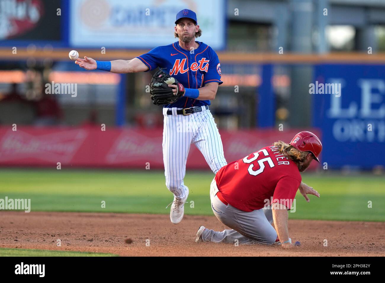 St. Louis Cardinals' Taylor Motter (55) is out at second as New York ...