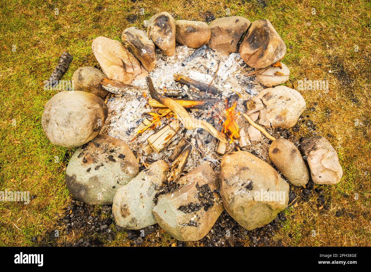 Campfire in nature in stones stacked in a circle Stock Photo - Alamy