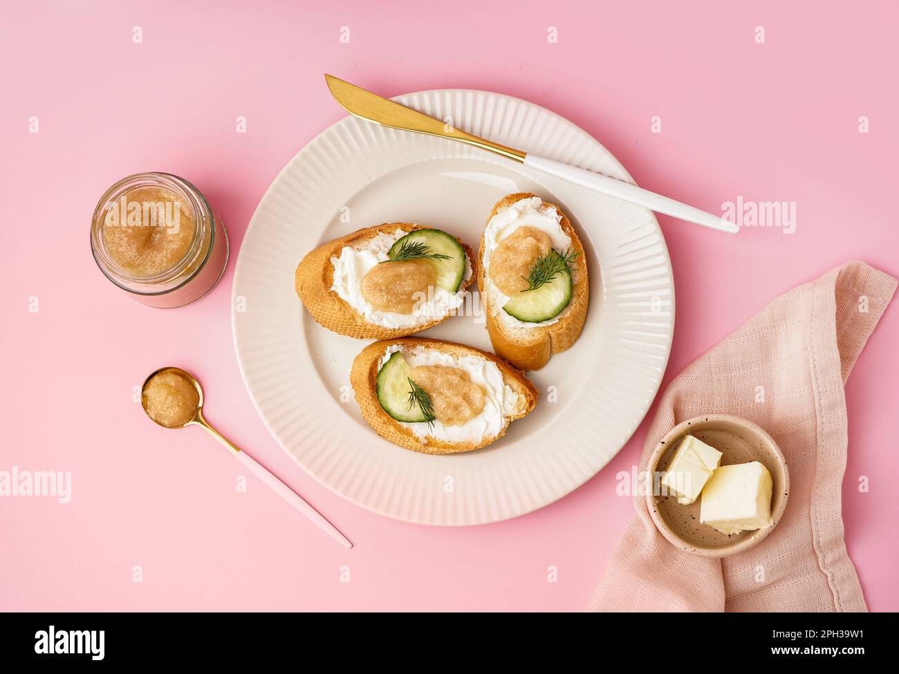Delicious canapes with caviar of capelin on pink background Stock Photo ...