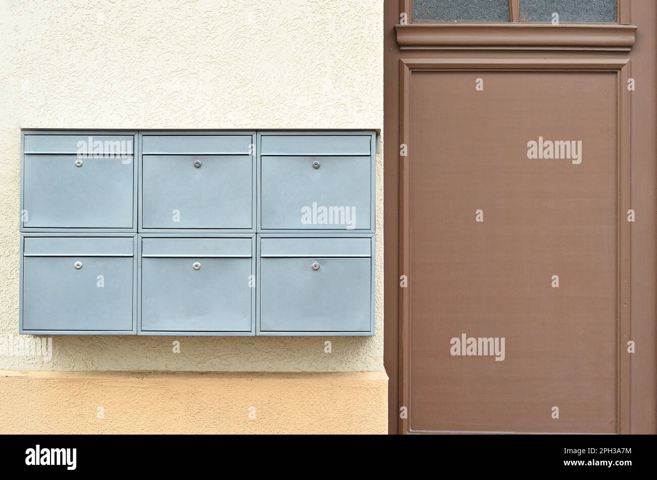 View of mailboxes on building wall Stock Photo - Alamy