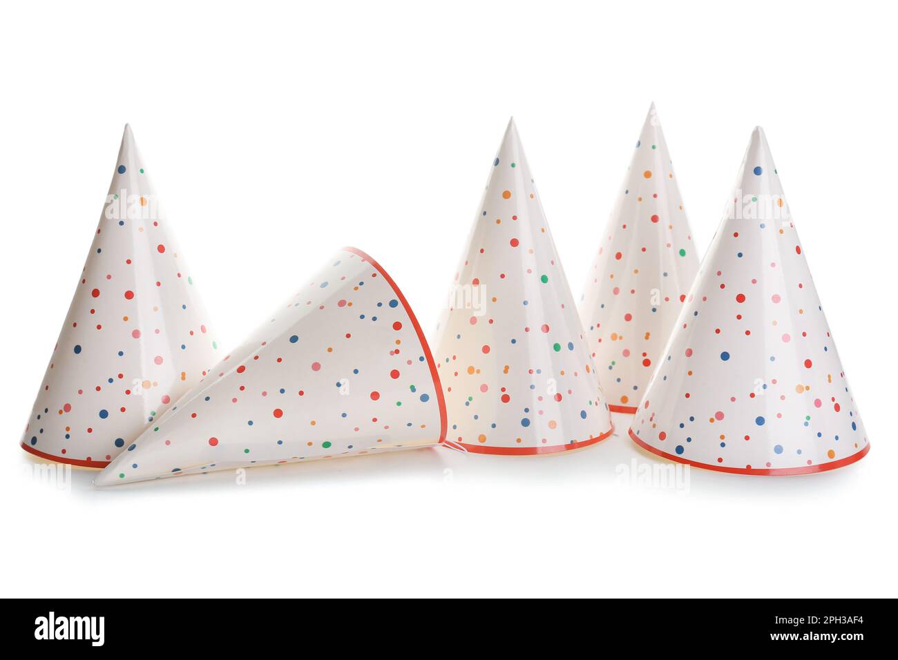 Party cone hats on white background Stock Photo - Alamy