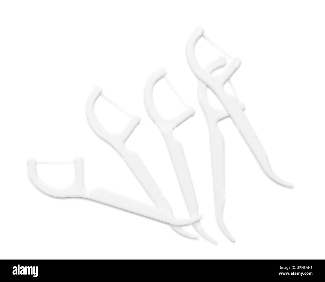 Floss toothpicks isolated on white background Stock Photo - Alamy Floss toothpicks isolated on white background Stock Photo - Alamy