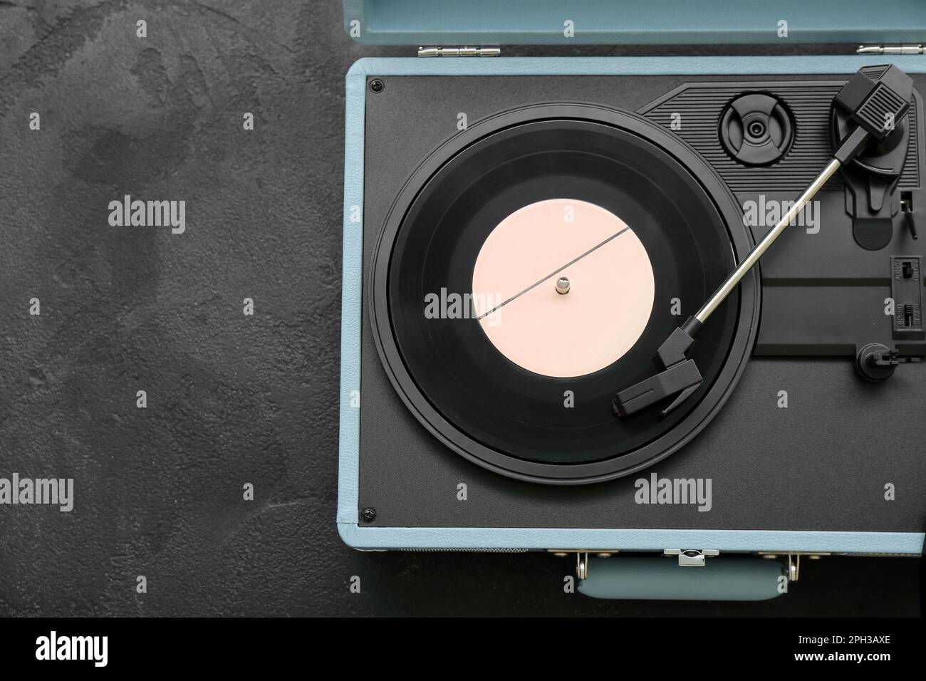 Record player with vinyl disk on dark background Stock Photo - Alamy