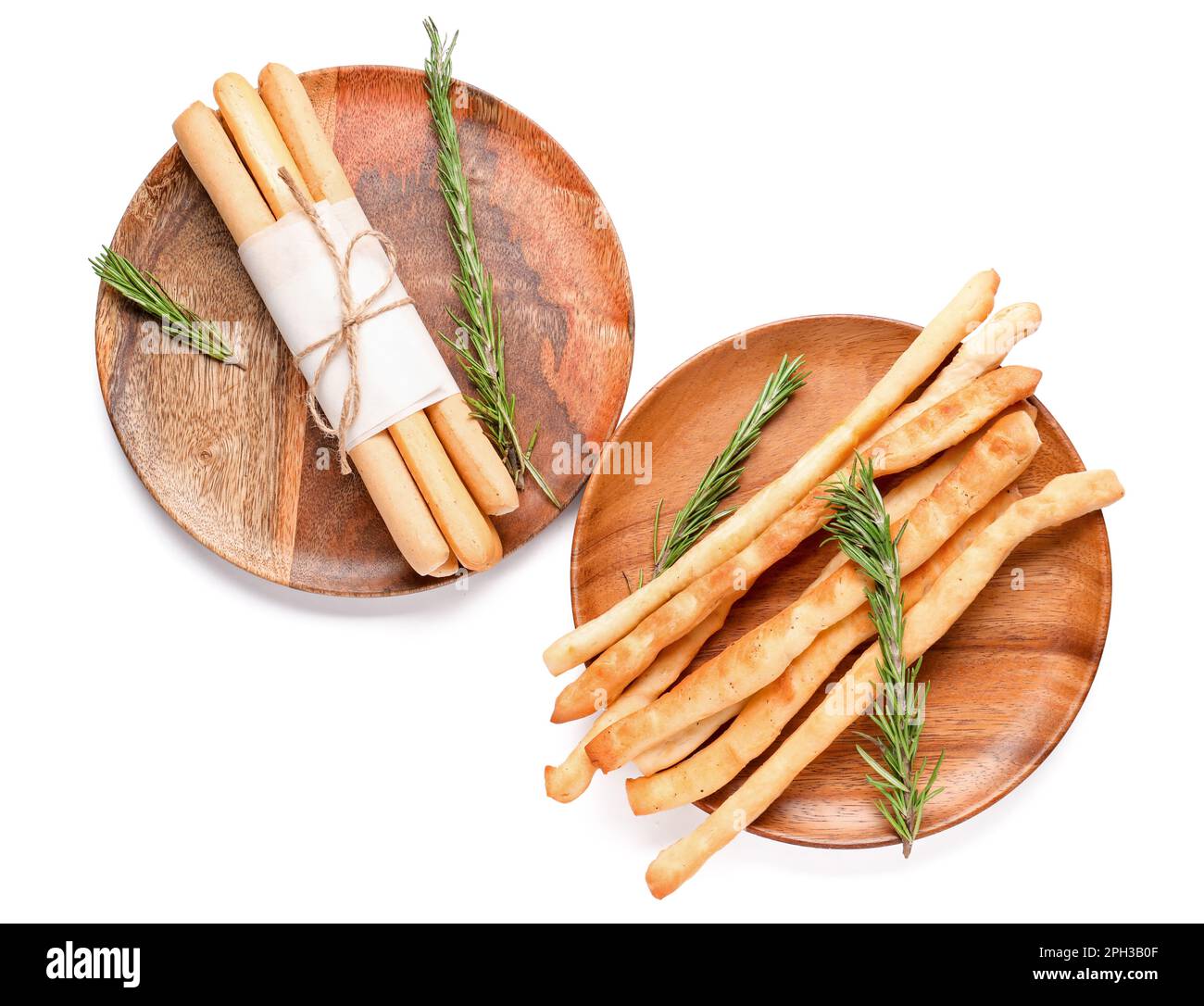 Plates with tasty Italian Grissini on white background Stock Photo - Alamy