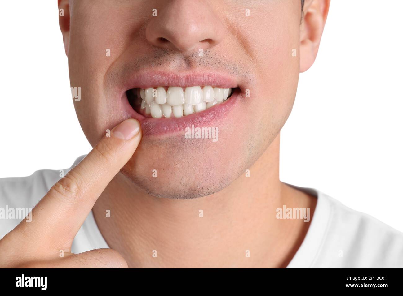 Man showing healthy gums on white background, closeup Stock Photo - Alamy