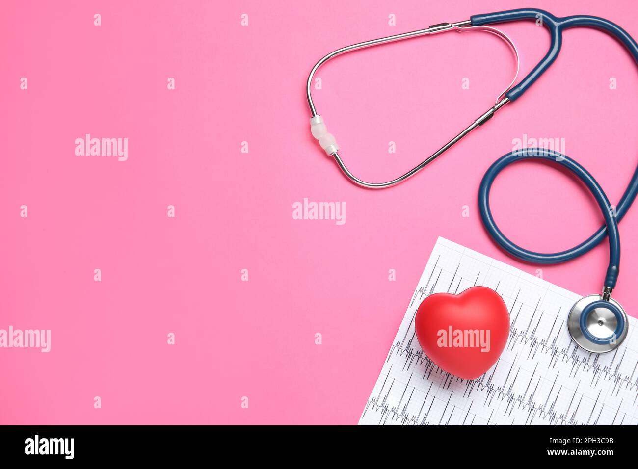 Stethoscope, cardiogram, red decorative heart and space for text on ...
