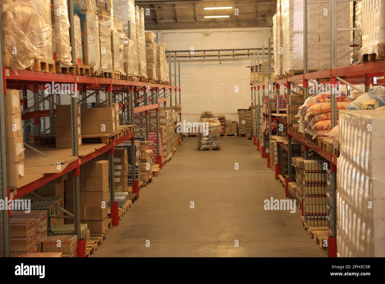 Warehouse with lots of products. Wholesale business Stock Photo - Alamy