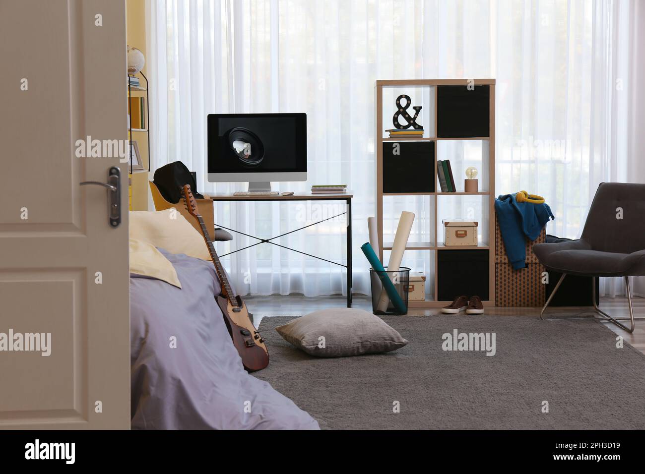 Stylish teenager's room interior with computer and bed Stock Photo - Alamy