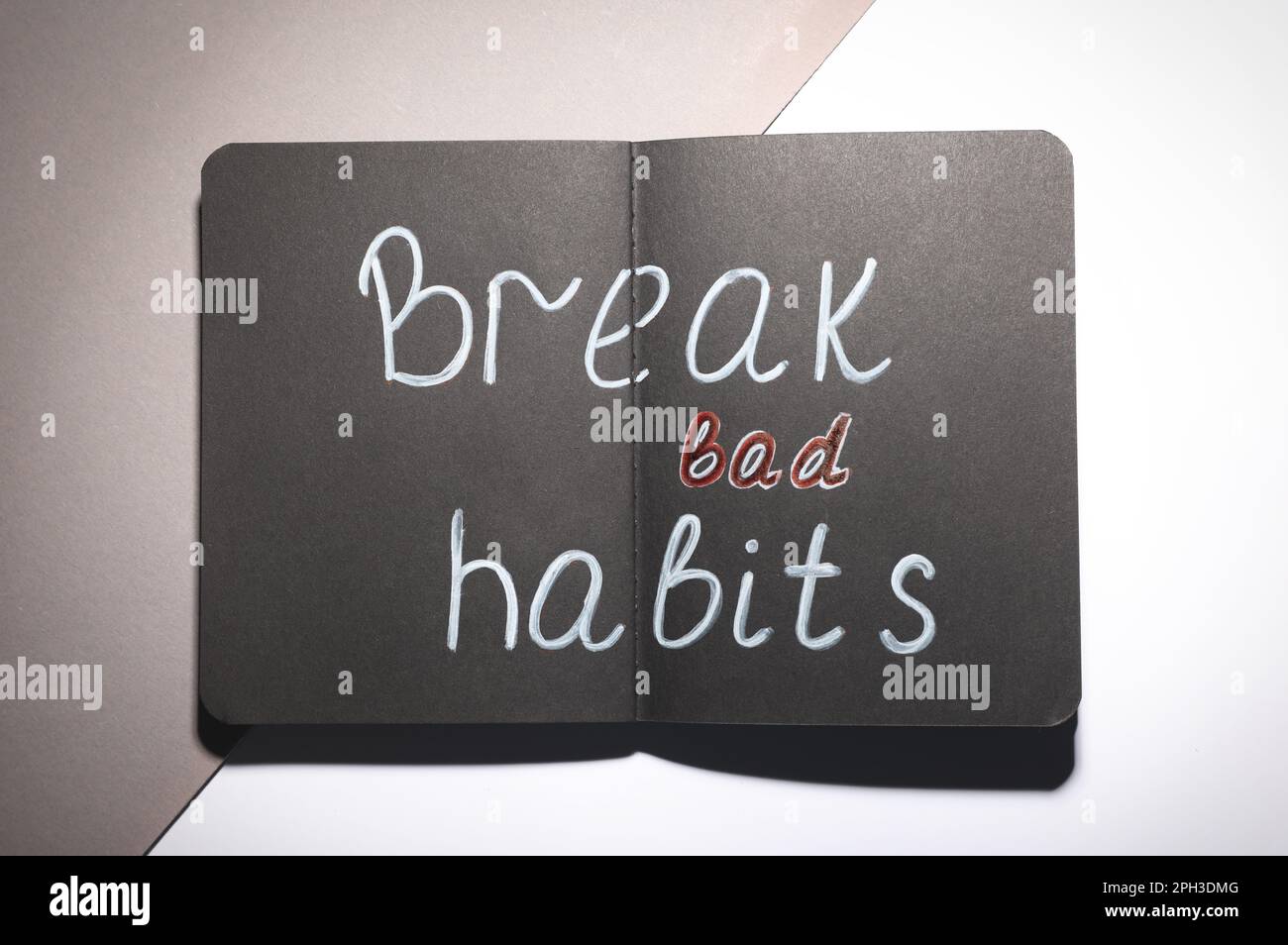 Open notebook with phrase Break Bad Habits on color background, top ...