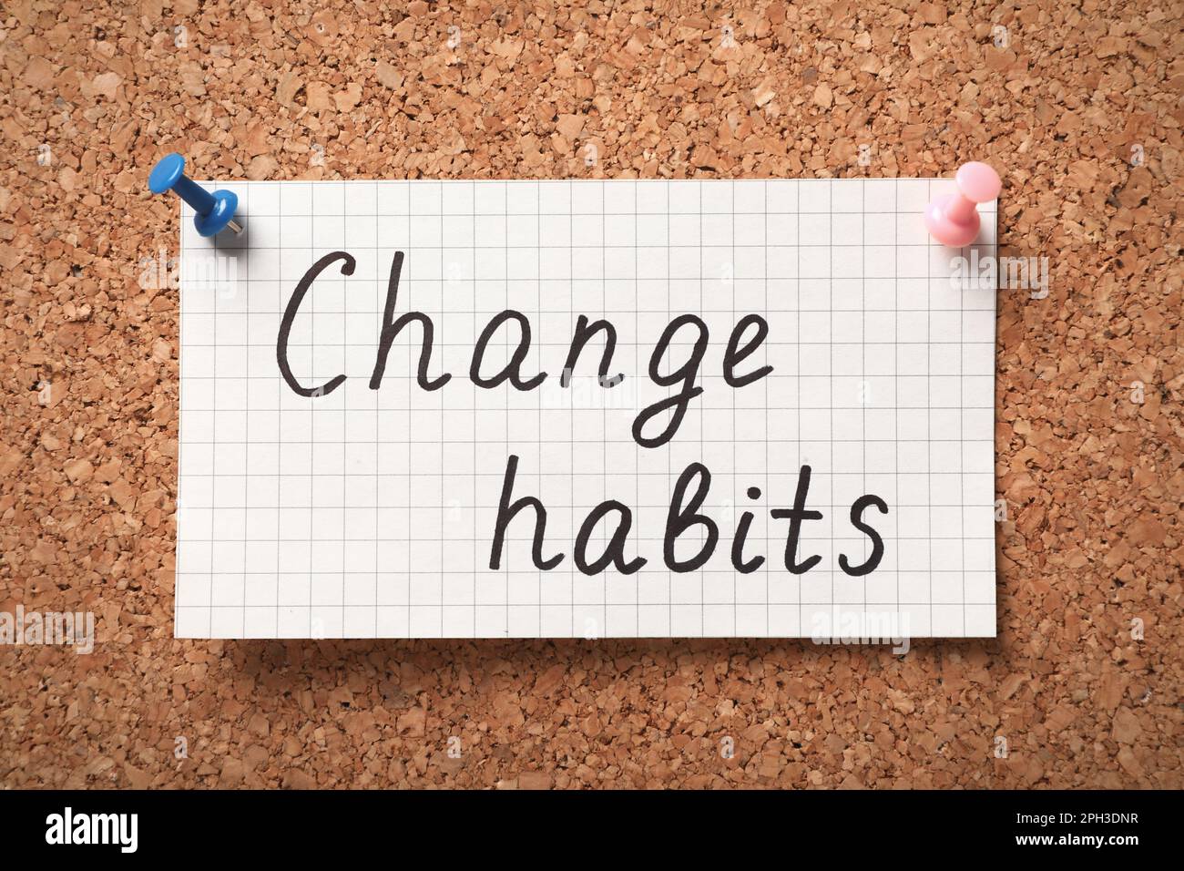 Sheet of paper with phrase Change Habits pinned to corkboard Stock ...