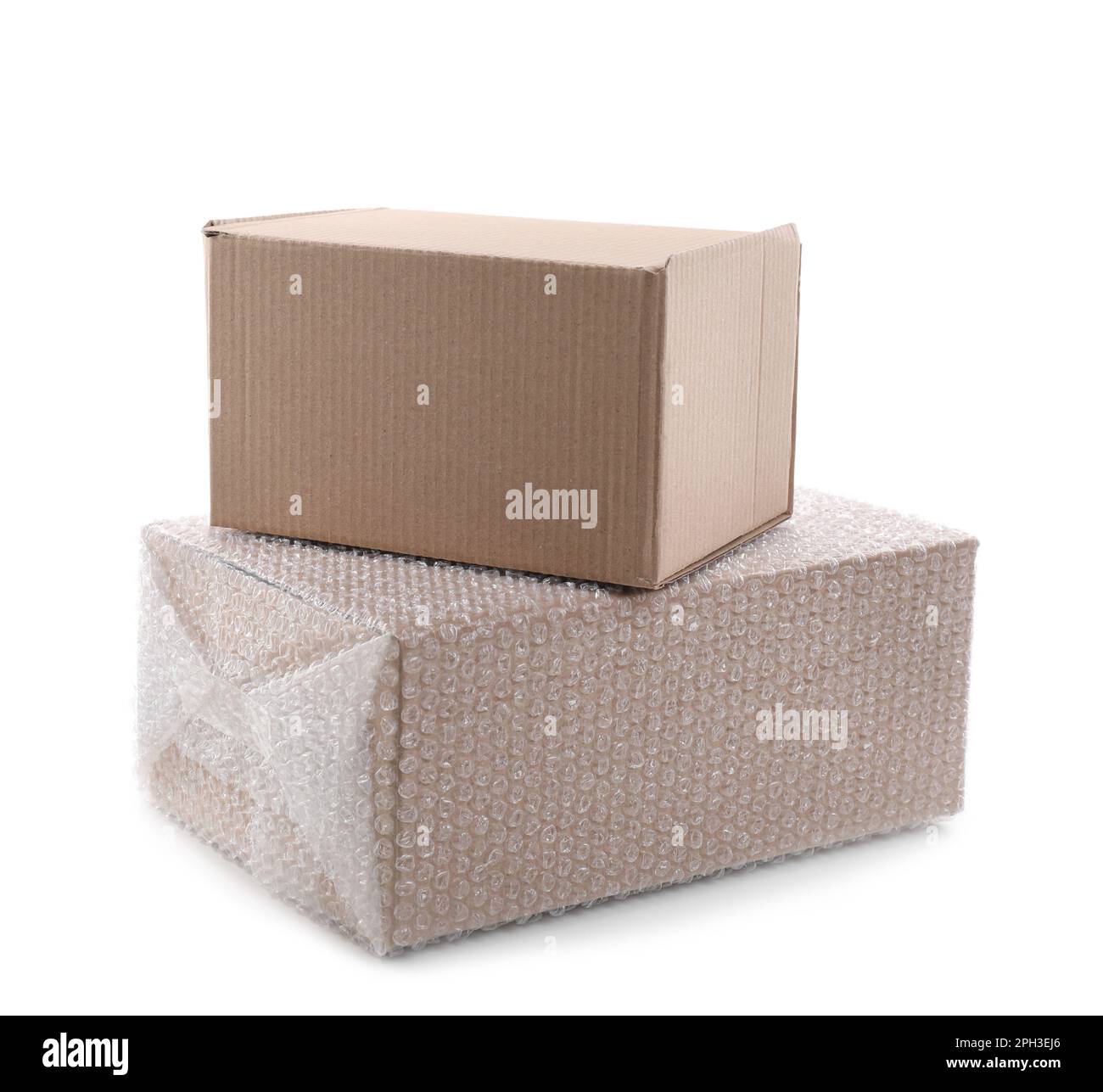 Cardboard box packed in bubble wrap and ordinary one on white ...