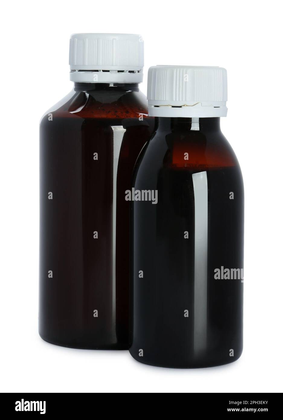 Bottles of cough syrup on white background Stock Photo - Alamy