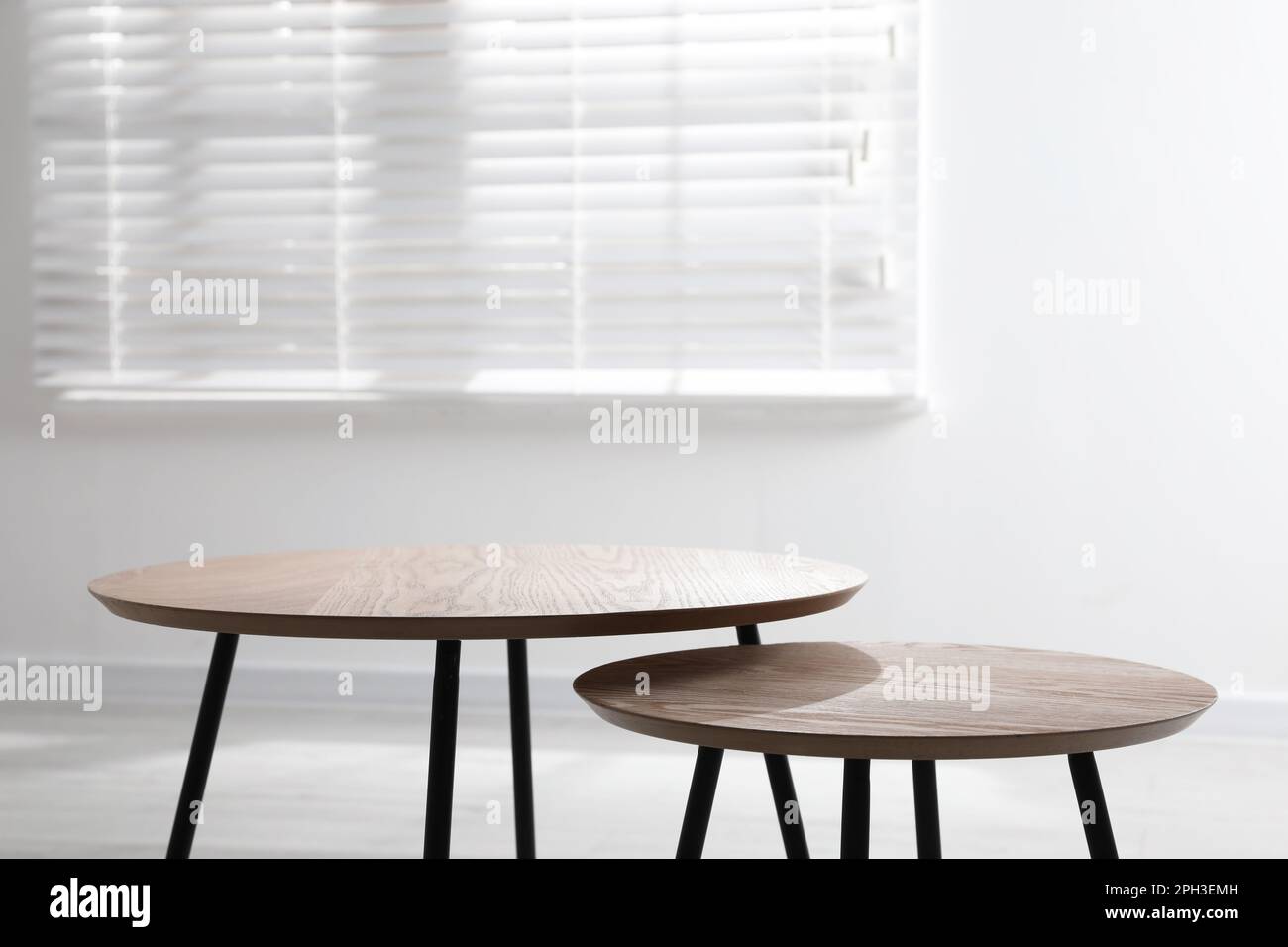 Minimalist wooden tables hi-res stock photography and images - Alamy