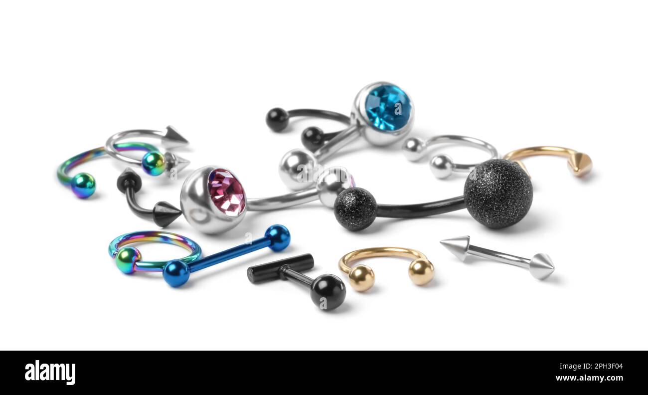 Different stylish piercing jewelry on white background Stock Photo - Alamy