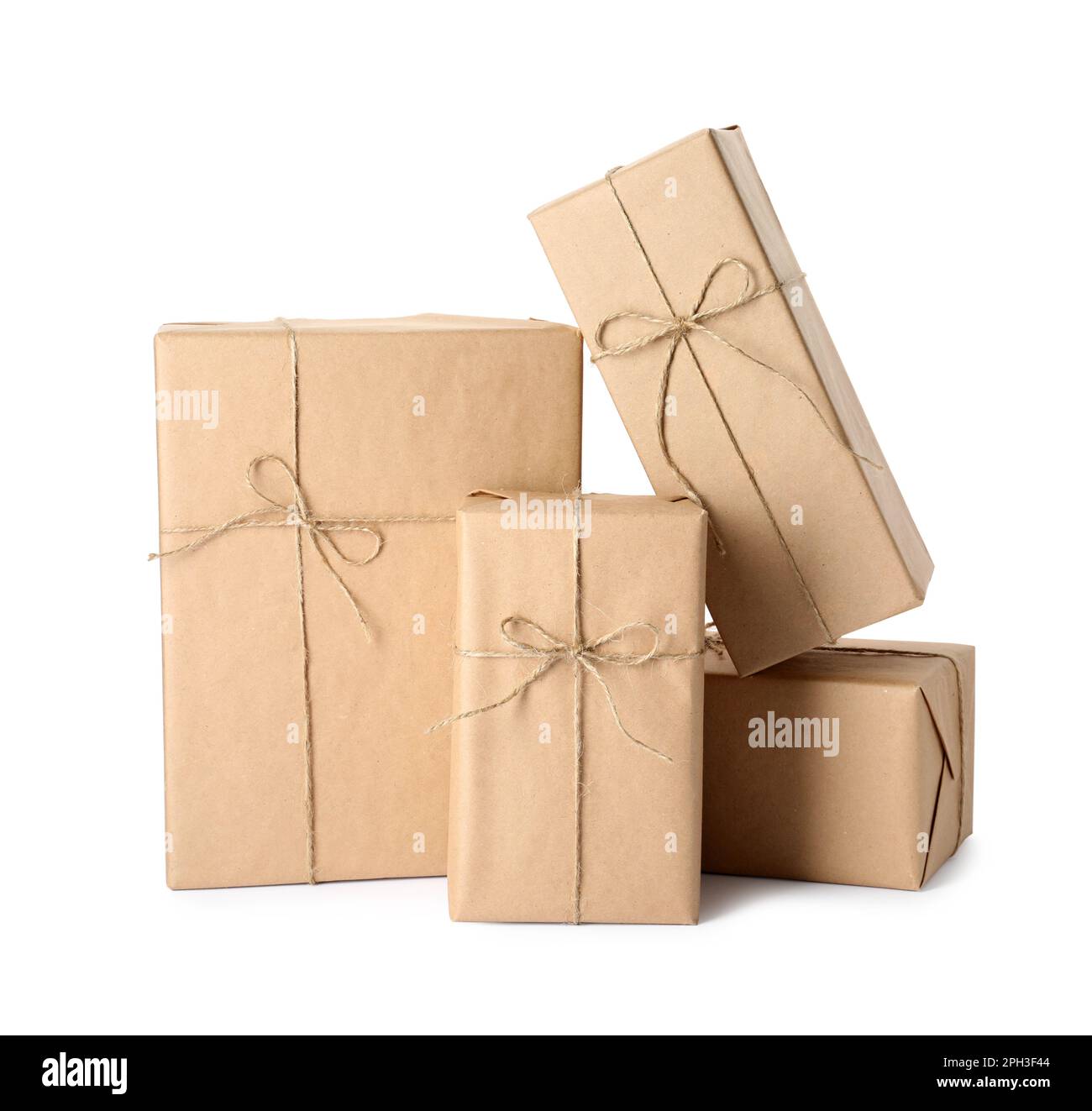 Parcels wrapped with kraft paper and twine on white background Stock ...
