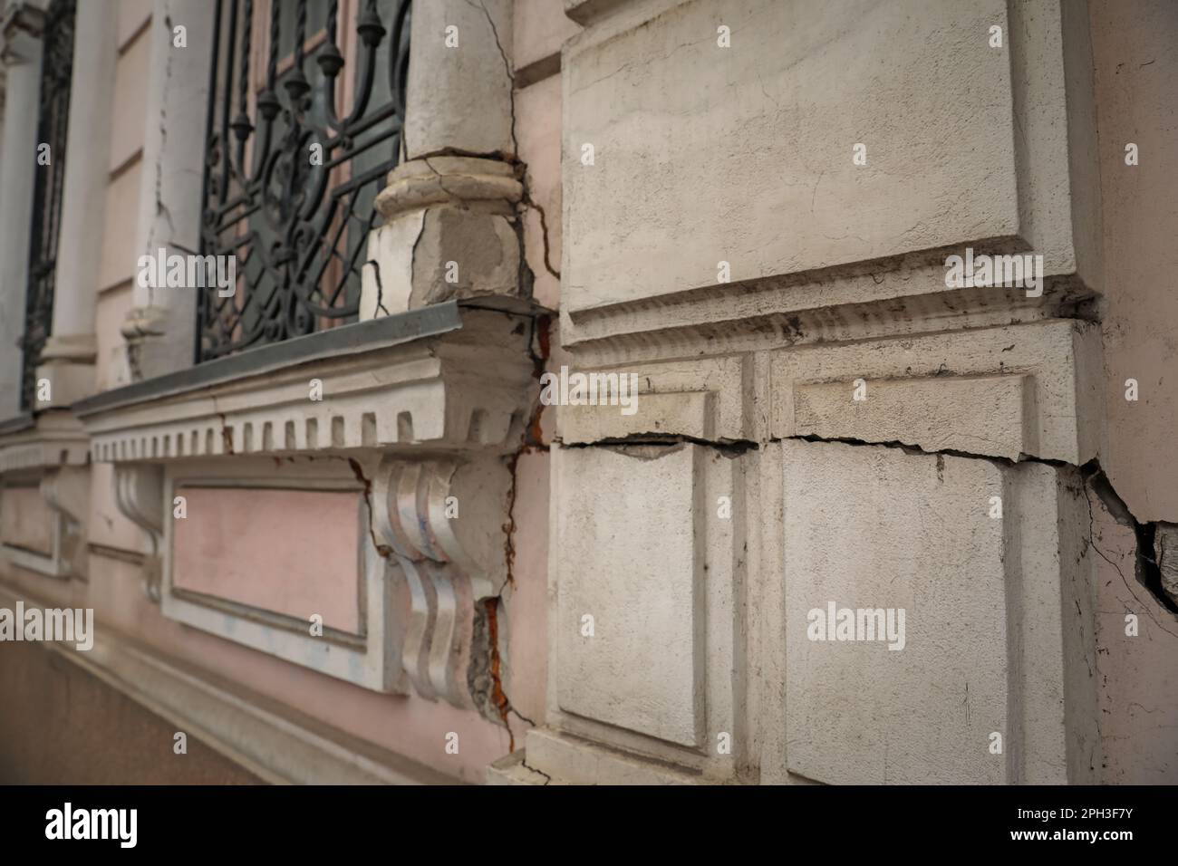 Large cracks on front of building after strong earthquake Stock Photo ...