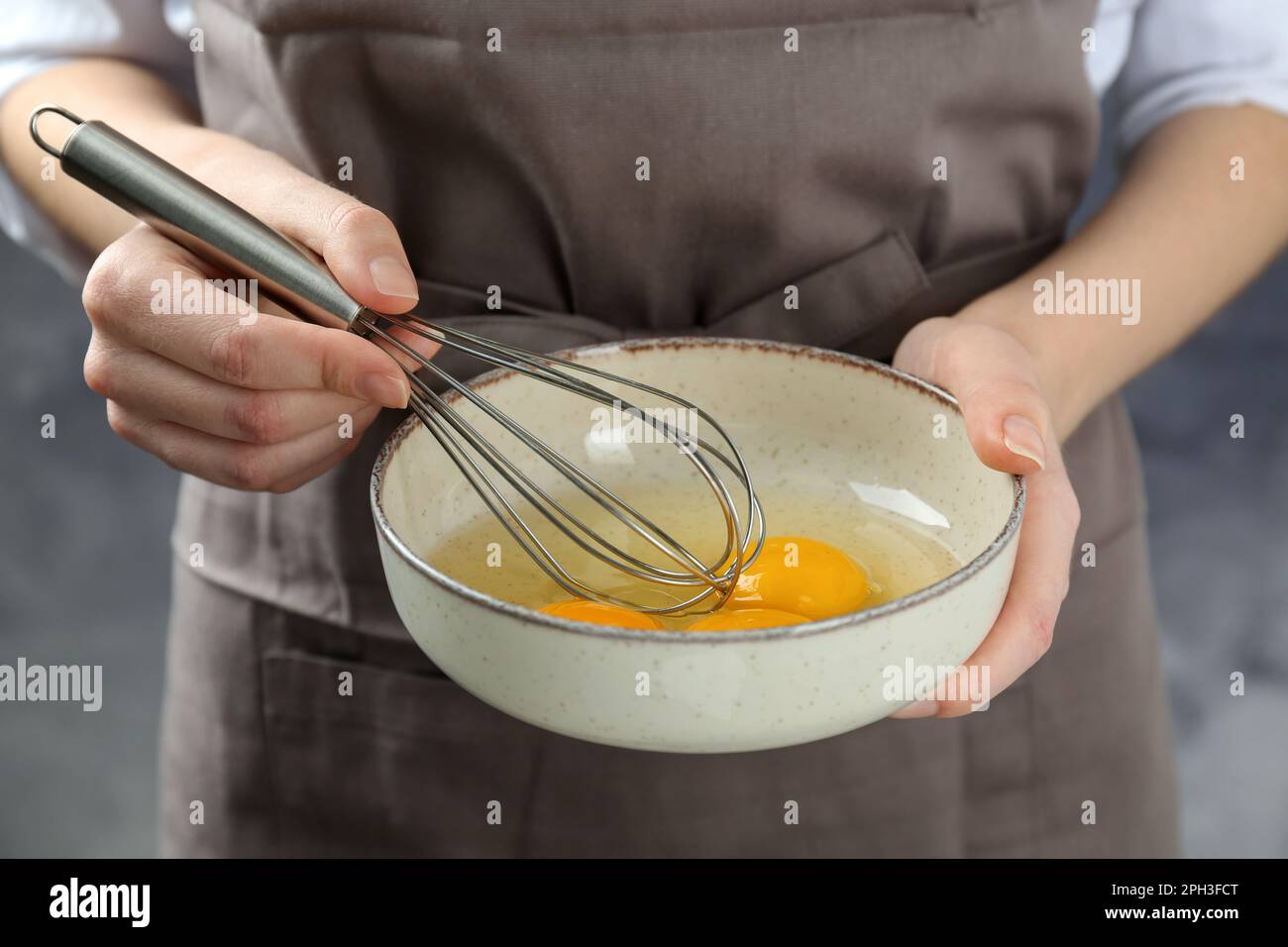 Cooking process woman whisking eggs hi-res stock photography and images ...