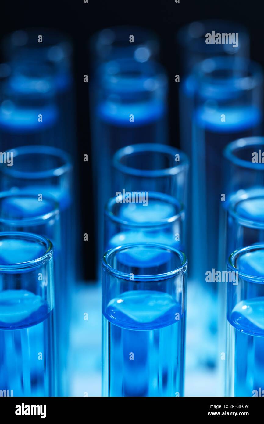 Test tubes with blue reagents, closeup. Laboratory analysis Stock Photo ...