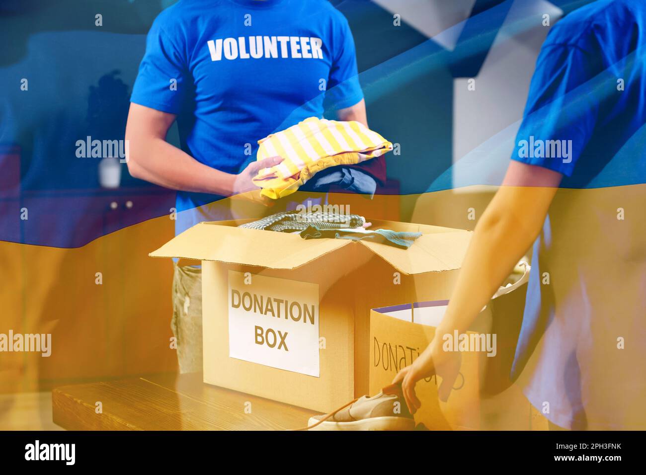 Double exposure of volunteers packing donation boxes and Ukrainian flag ...
