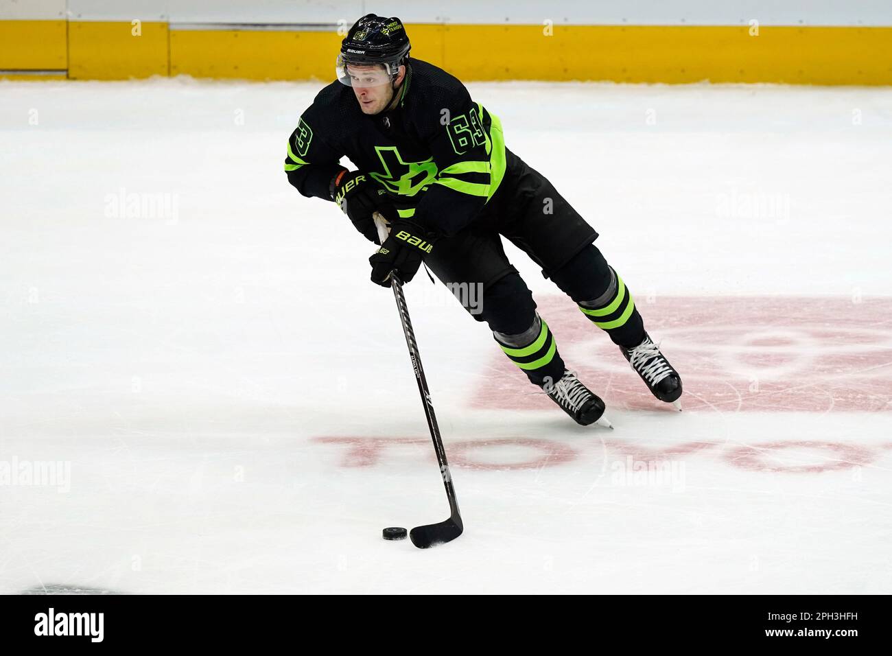 Dallas Stars right wing Evgenii Dadonov (63) skates with the puck ...