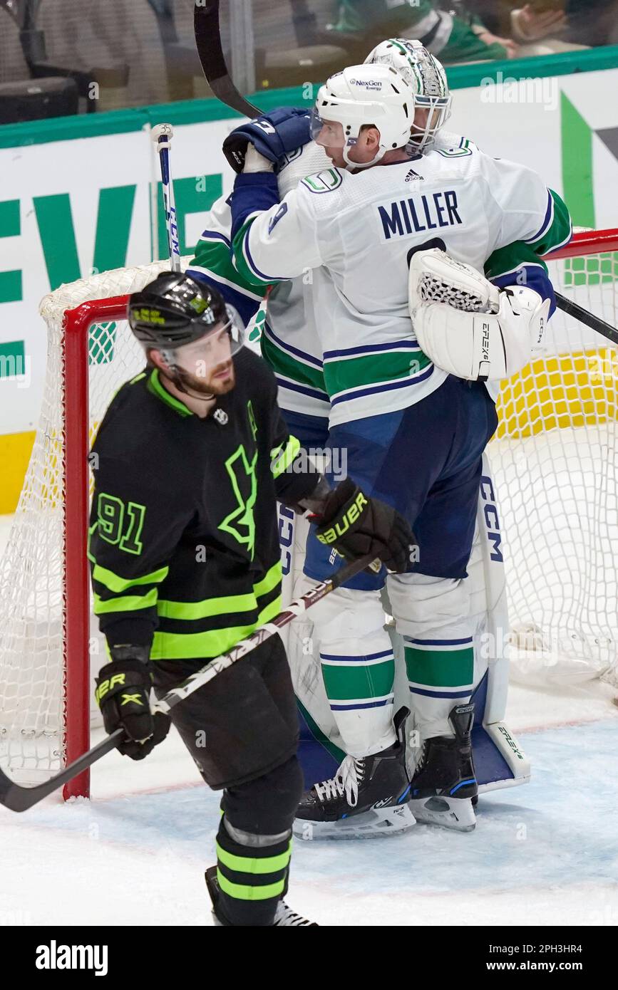 Vancouver Canucks goaltender Thatcher Demko gets a hug from J.T. Miller ...