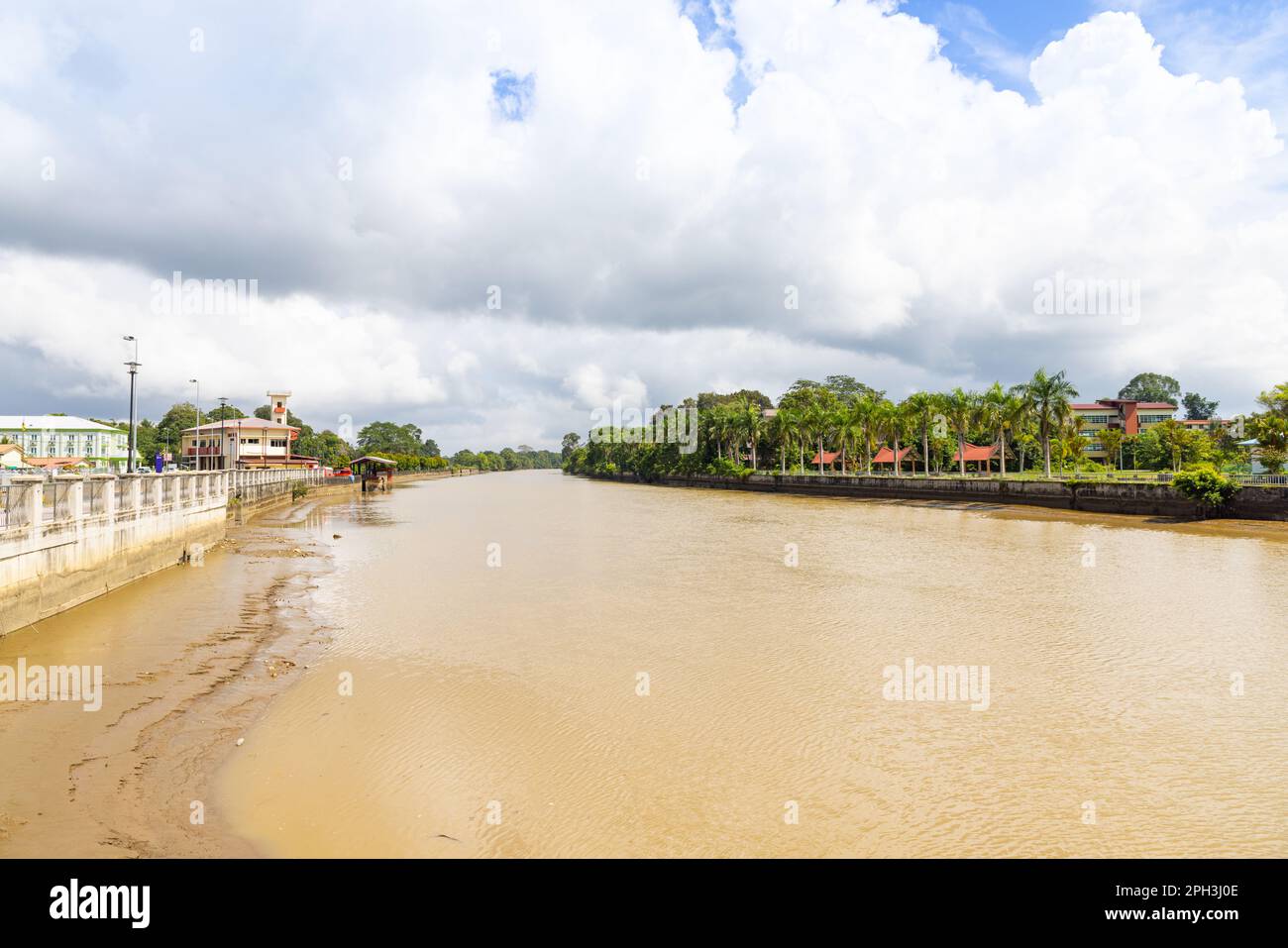 buildings and trees along Sungai Temburong river in the Temburong ...