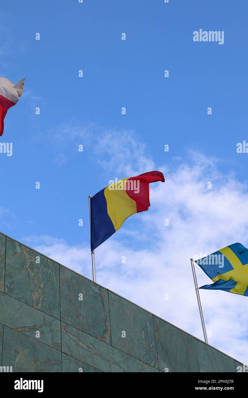 The Romanian Flag Waving on Top of the Building with Other Nations ...