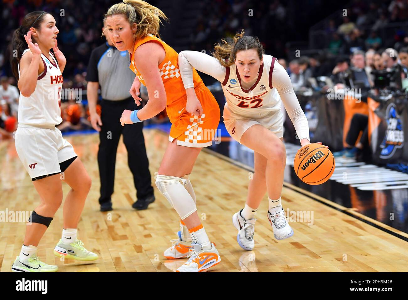 March 25, 2023: Virginia Tech Hokies guard Cayla King (22) drives down ...