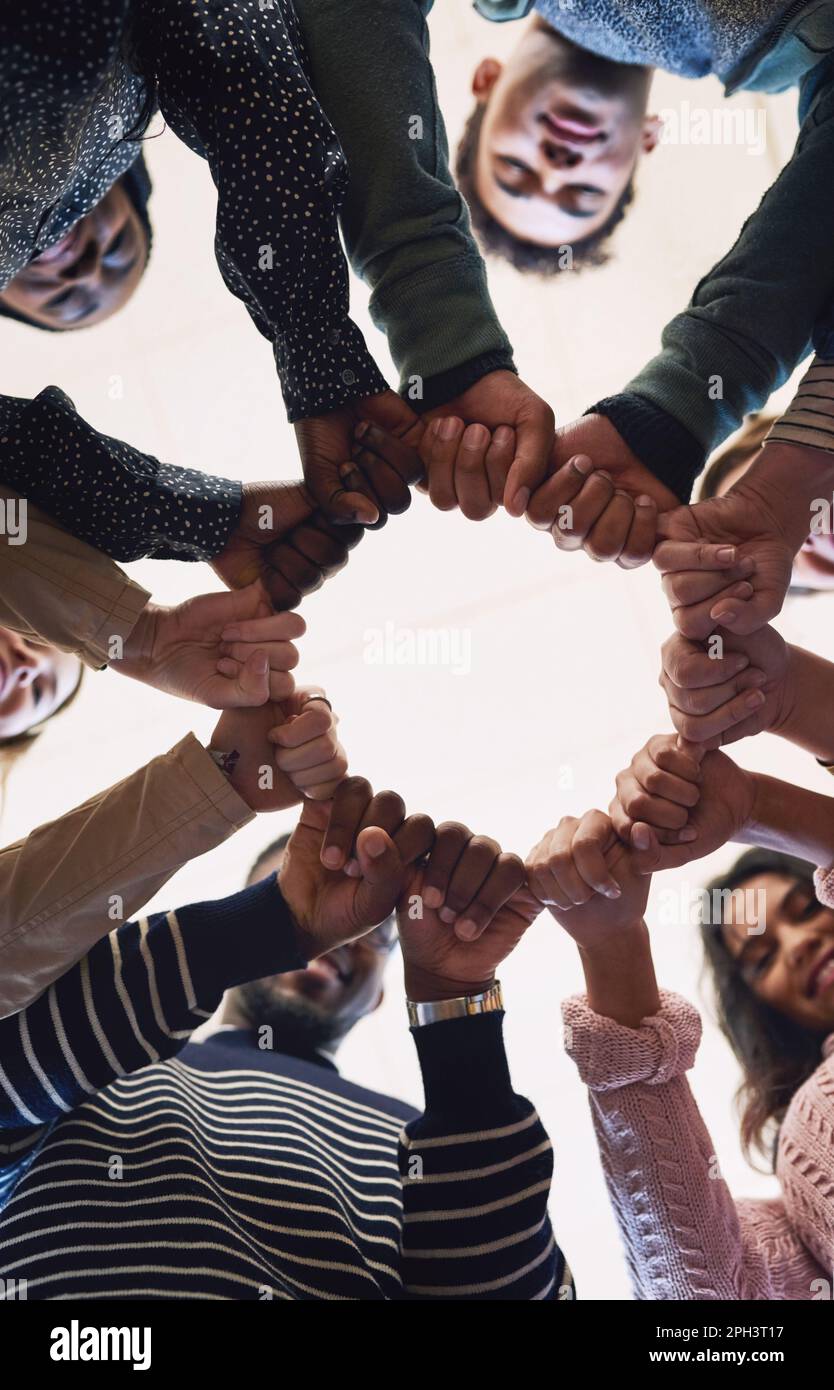 Our inner circle of friends. Low angle portrait of a group of young ...