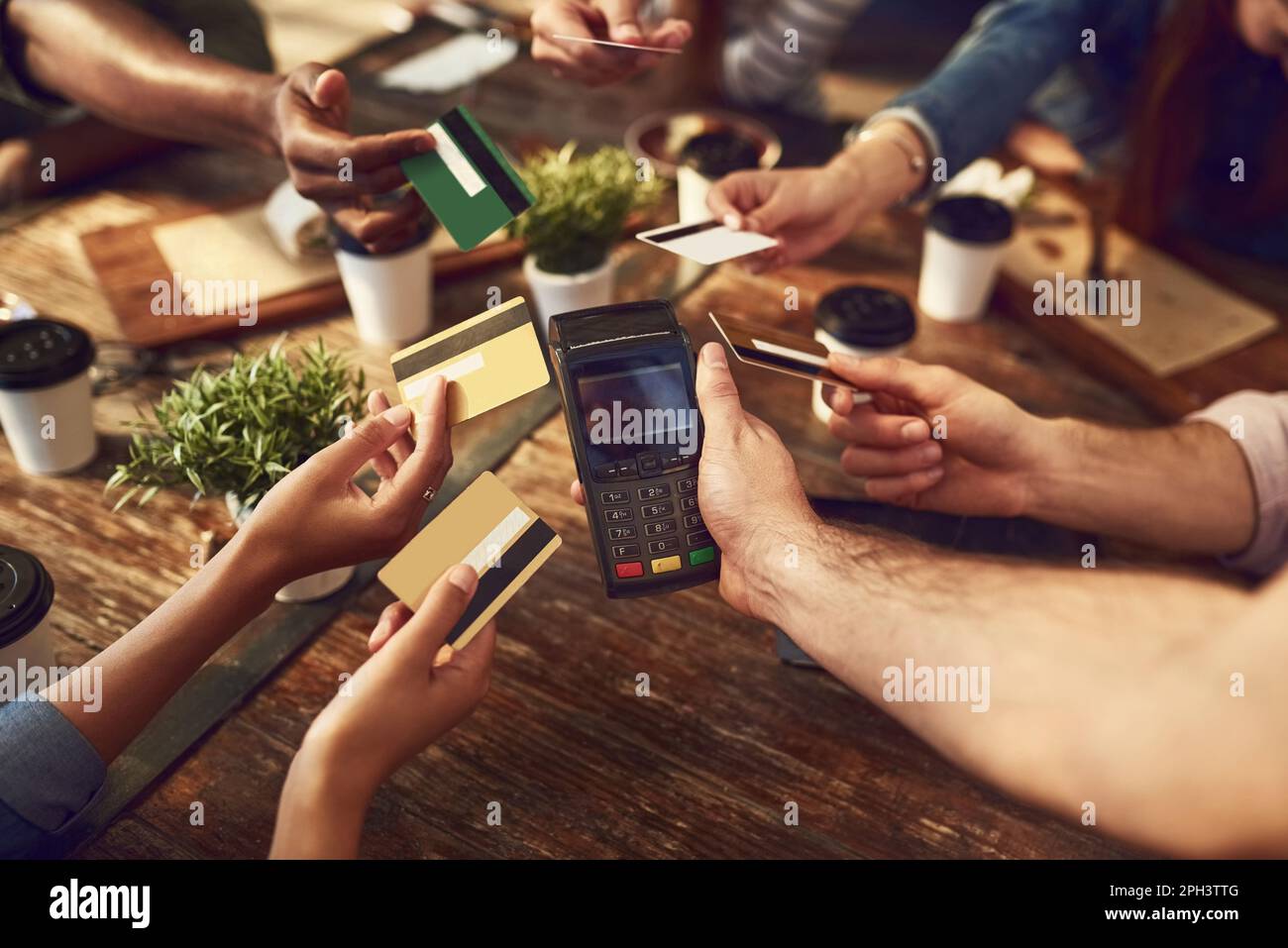 Splitting it six ways. High angle shot of an unrecognizable group of ...