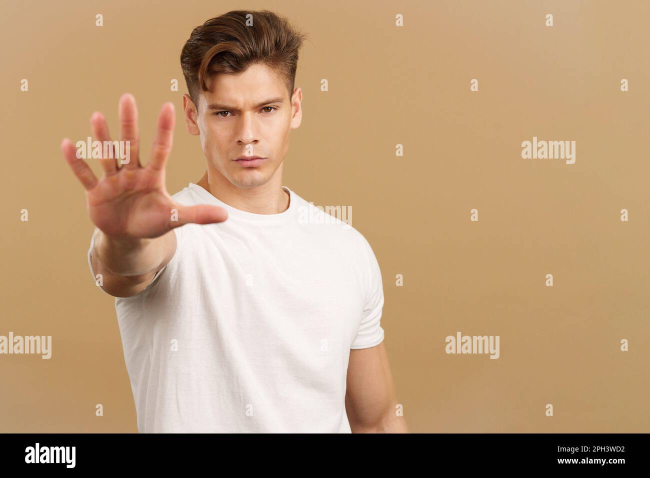 Handsome man standing hand hi-res stock photography and images - Alamy