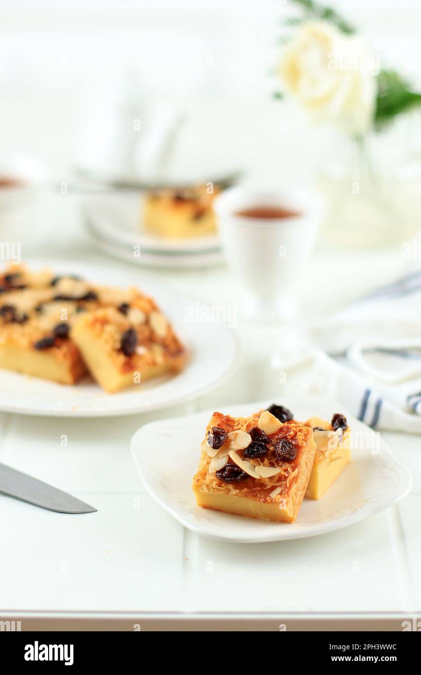 Sliced Homemade Prol Tape or Bolu Tapai on White Plate. Prol Tape is ...