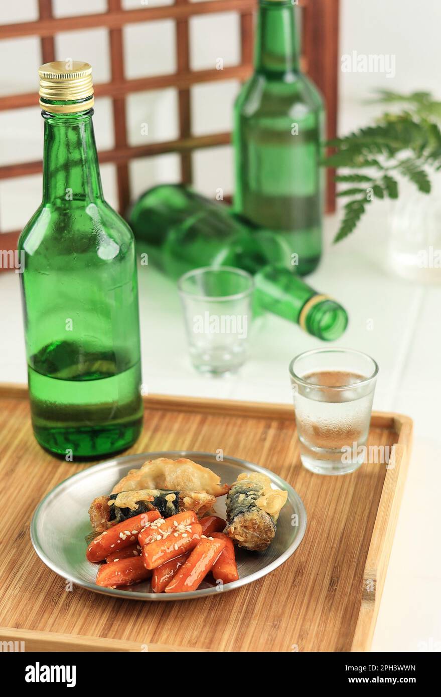 Soju Bottle and Tteokbokki Korean Anju Side Dish Menu Stock Photo - Alamy