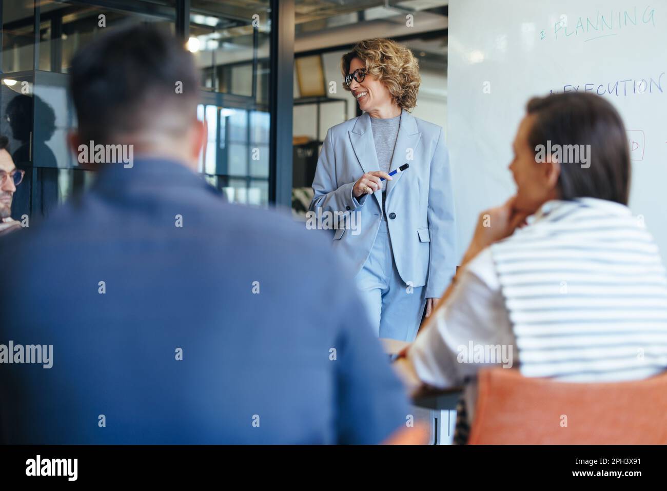 business colleagues having a discussion in a presentation. Team of ...