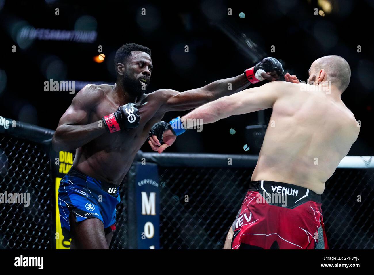 SAN ANTONIO, TEXAS - MARCH 25: (L-R) Chidi Njokuani punches Albert ...