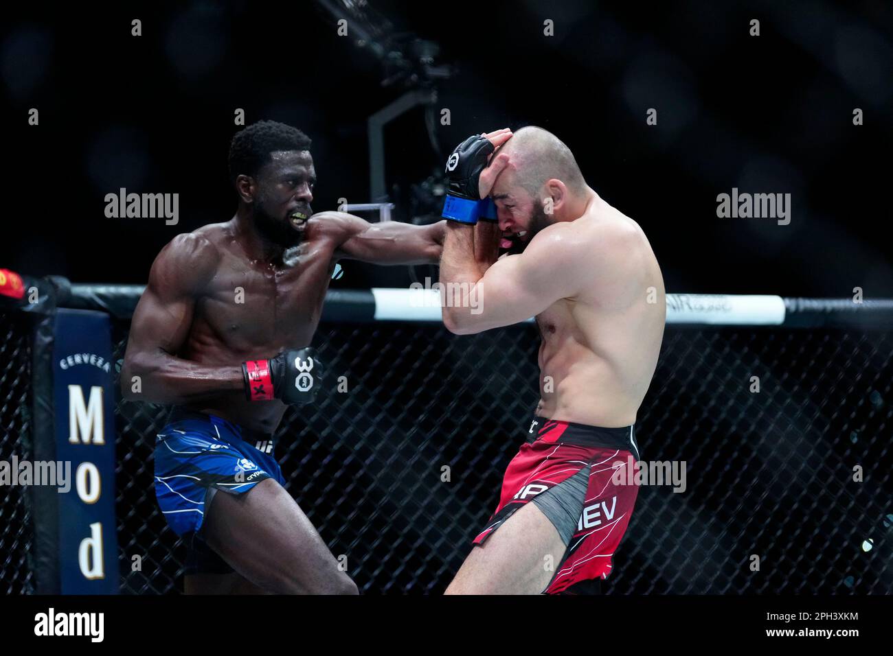 SAN ANTONIO, TEXAS - MARCH 25: (L-R) Chidi Njokuani punches Albert ...