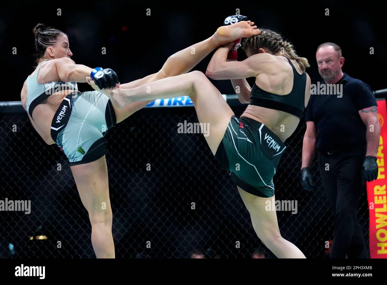 SAN ANTONIO, TEXAS - MARCH 25: (L-R) Maycee Barber kicks Andrea Lee in ...