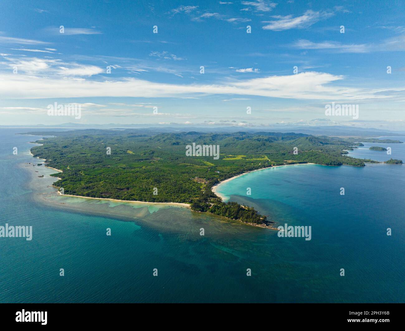 View from the sea to the island of Borneo with rainforest and mountains ...