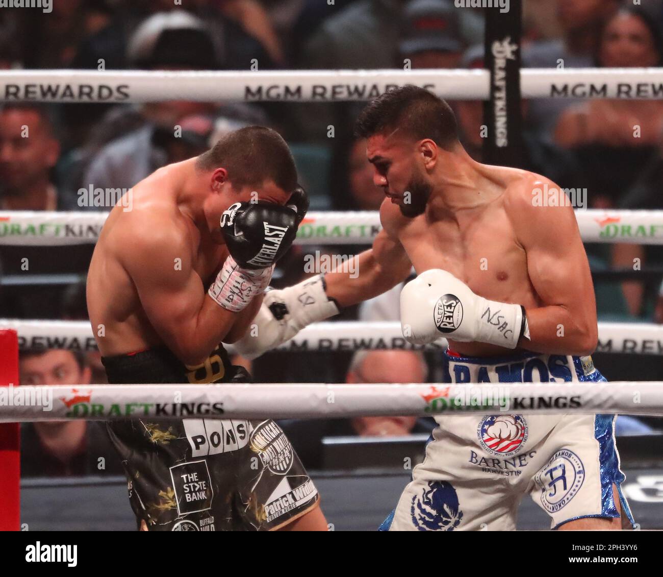 LAS VEGAS, NEVADA - MARCH 25: (R-L) Jesus Ramos punches Joseph Spencer ...