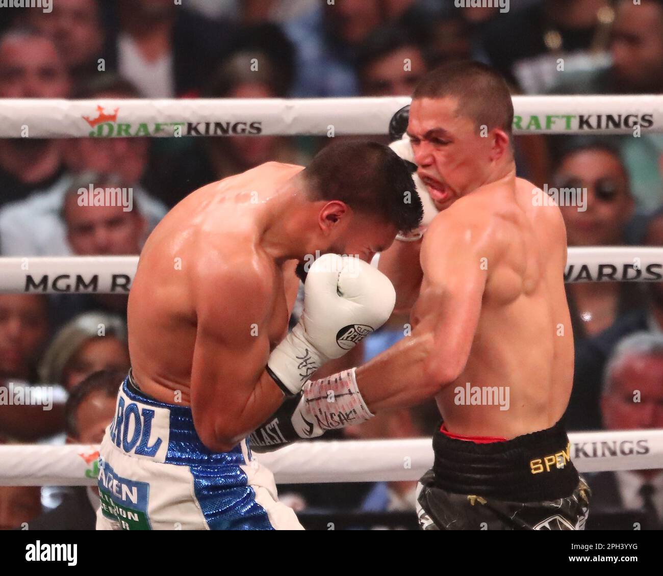LAS VEGAS, NEVADA - MARCH 25: (L-R) Jesus Ramos punches Joseph Spencer ...