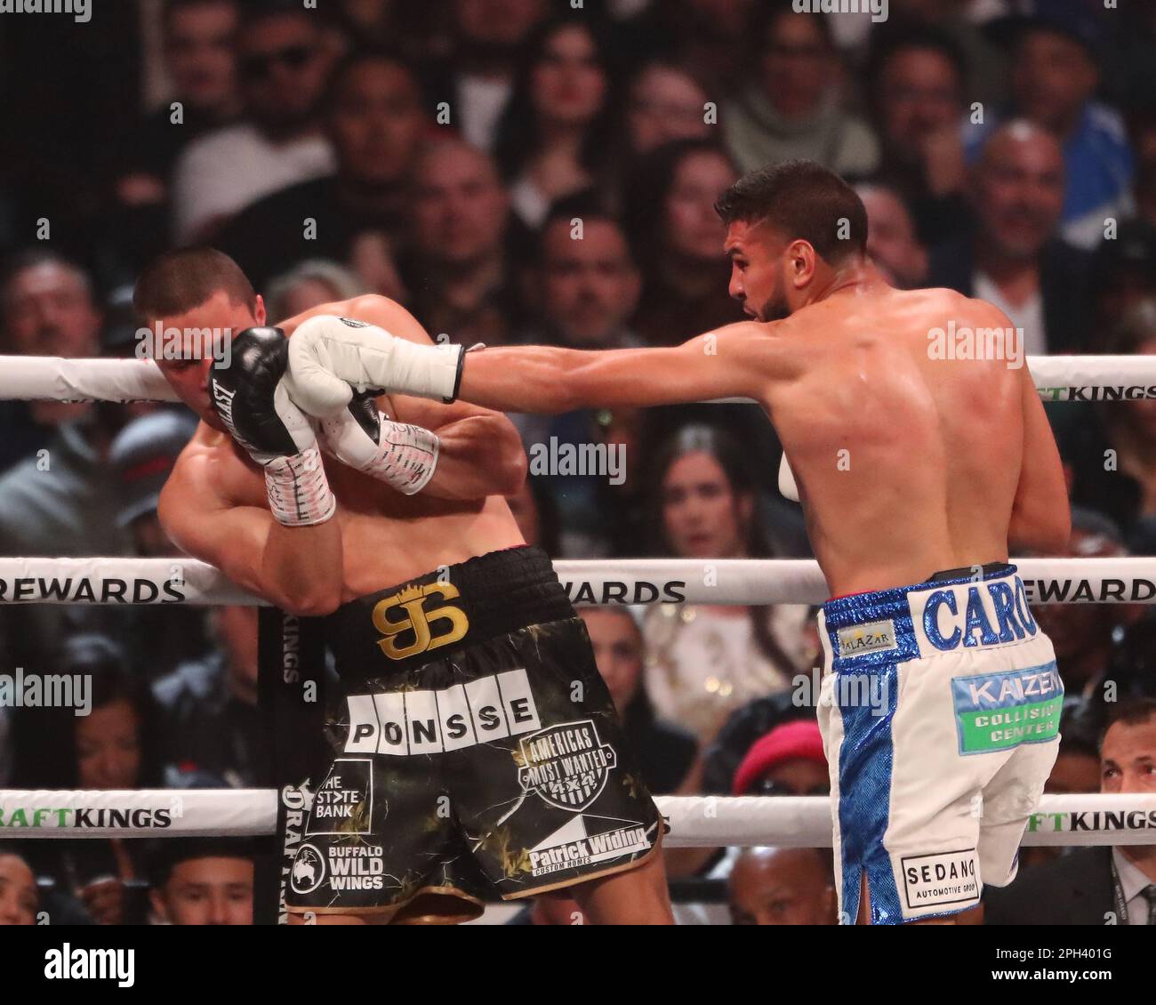 LAS VEGAS, NEVADA - MARCH 25: (R-L) Jesus Ramos punches Joseph Spencer ...