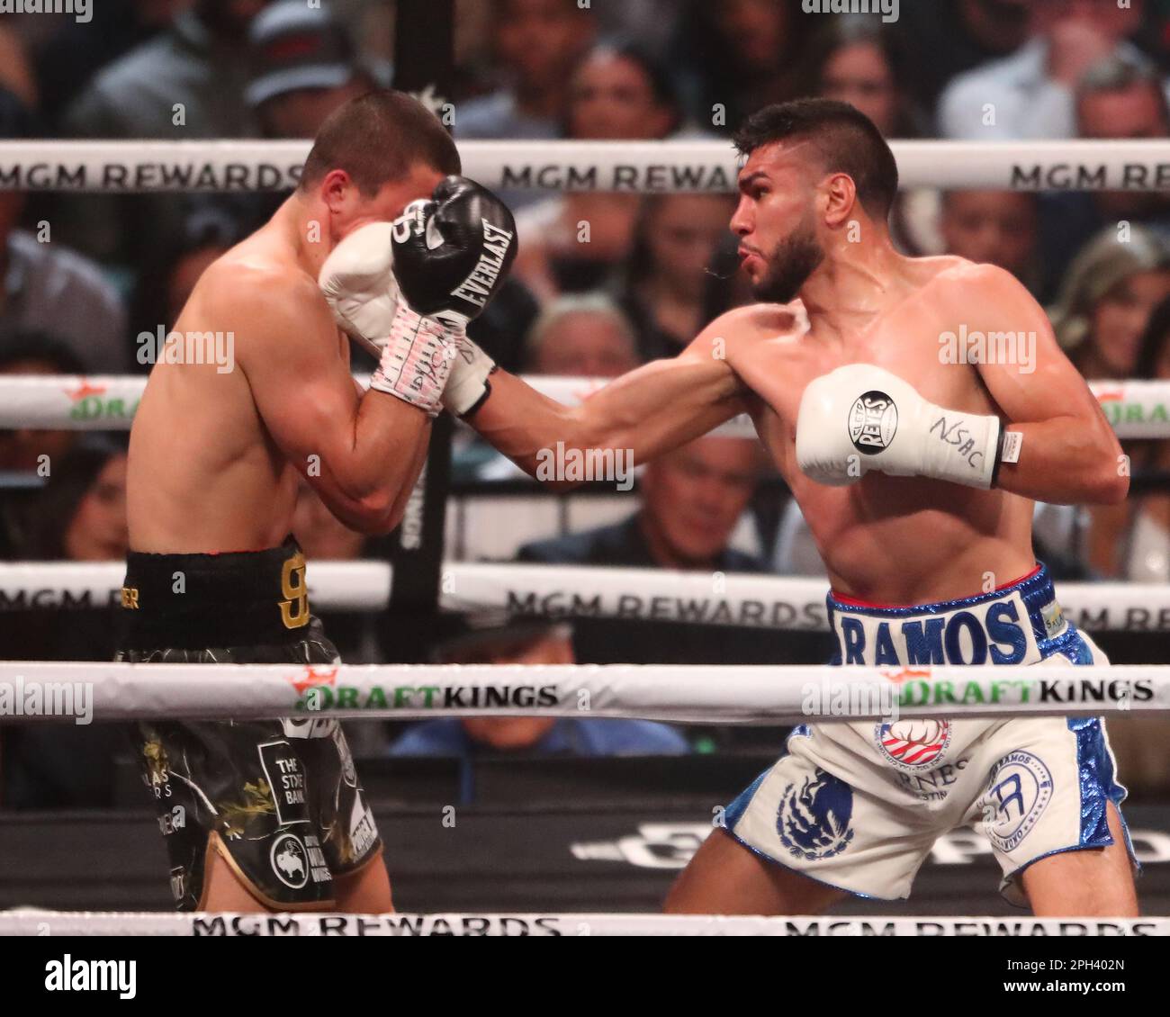 LAS VEGAS, NEVADA - MARCH 25: (R-L) Jesus Ramos punches Joseph Spencer ...