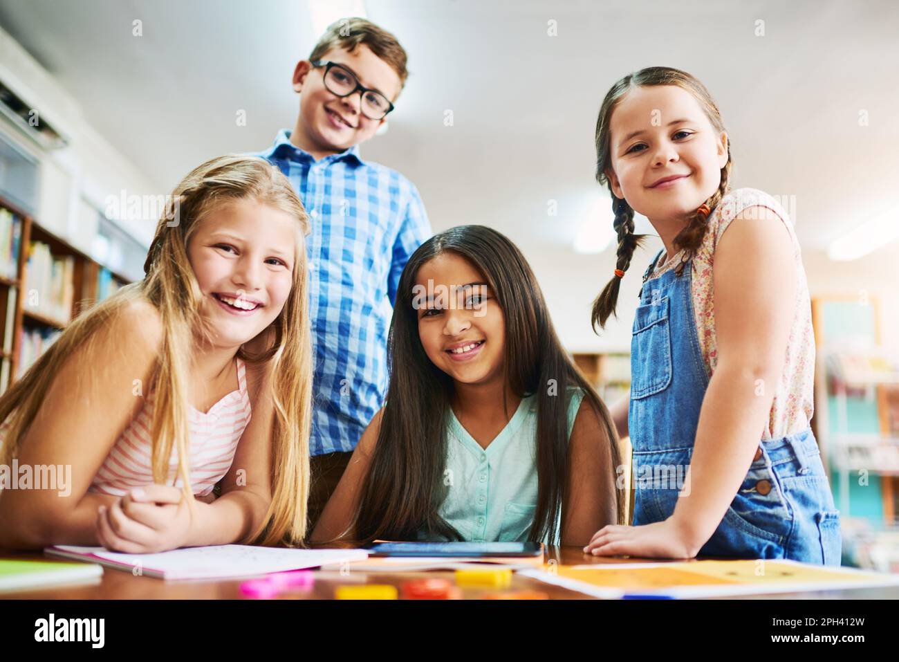 We are the top students in the class. Portrait of a group of cheerful ...