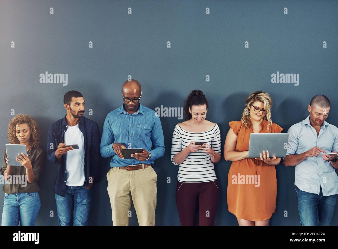 There are many ways to connect. Studio shot of a diverse group of ...