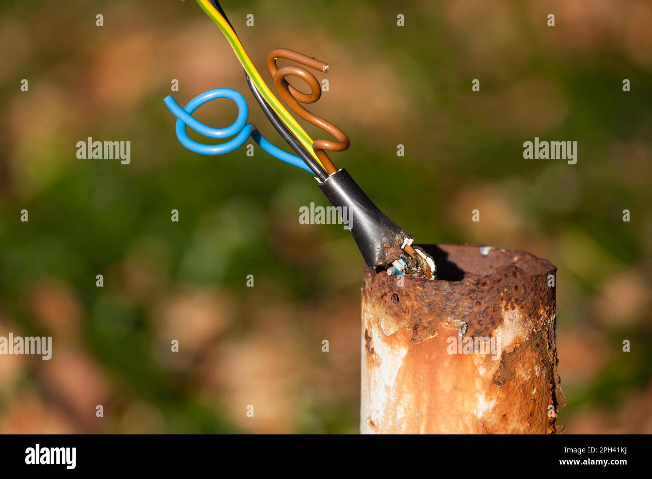 Old cable uninsulated Stock Photo - Alamy